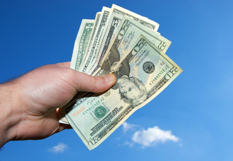 Hand full of money stock image. Image of heaven, falling - 14007693