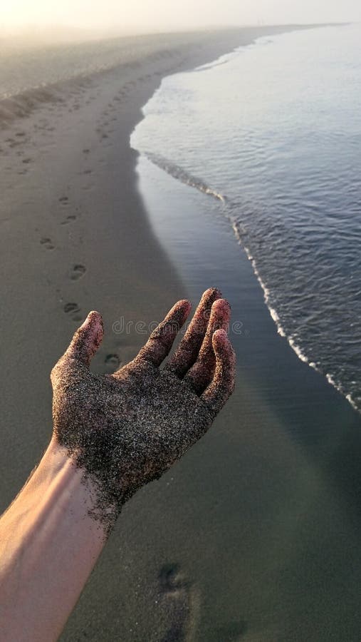 A Hand Full with Sands of Time Stock Image - Image of steal, rock ...