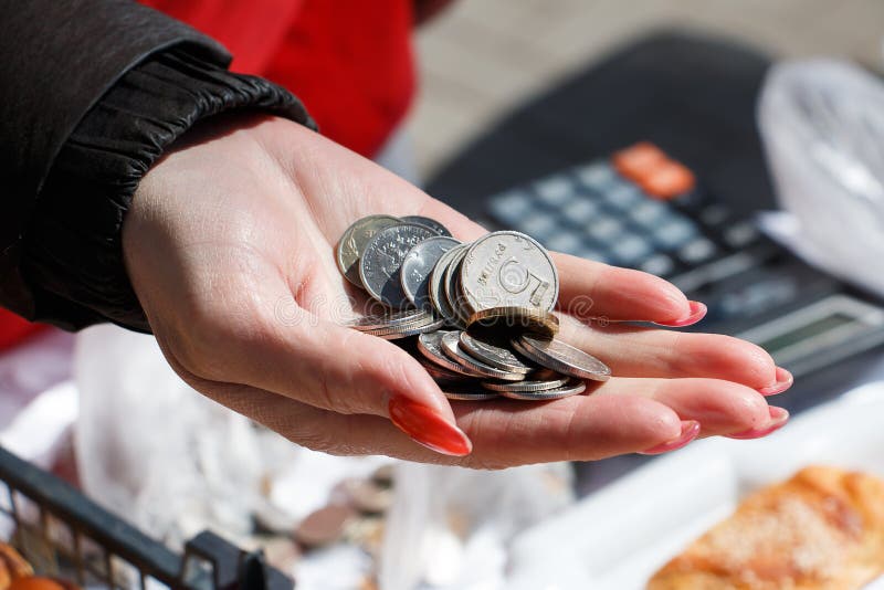 A Hand Full of Small Change Stock Image - Image of concept, cash: 147362437