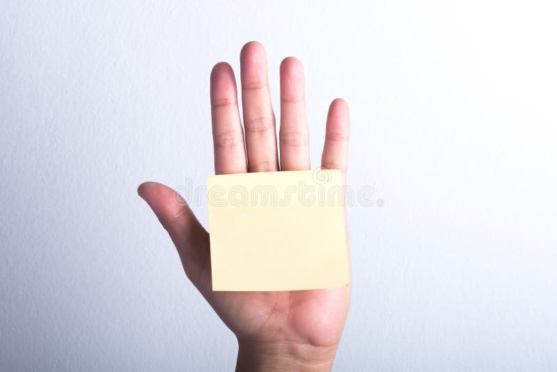Hand and note paper stock photo. Image of design, business - 108454490
