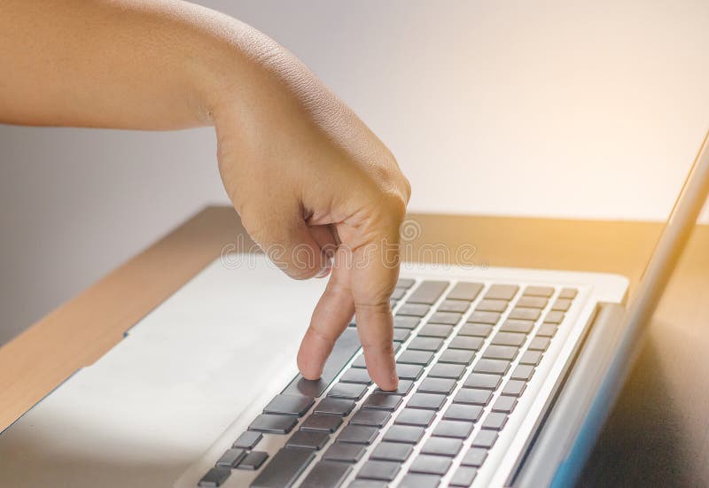 Hand Gesture with Two Fingers on the Laptop Computer Stock Photo ...