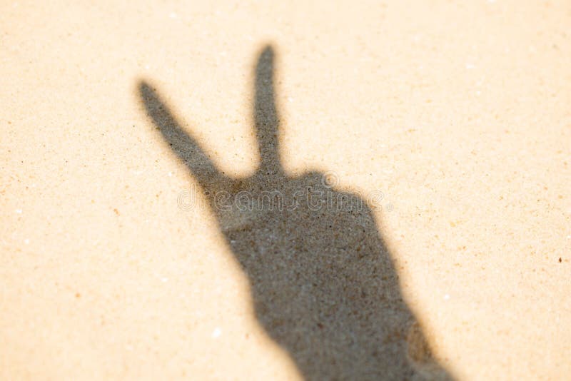 Gesture victory shadow stock image. Image of finger - 148330479