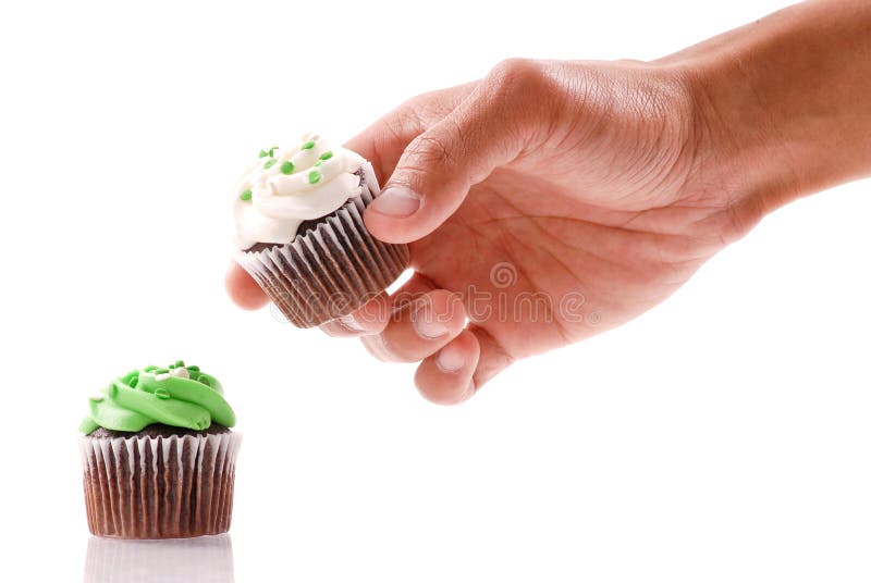 Hand Getting a Cupcake stock photo. Image of culinary - 19566604