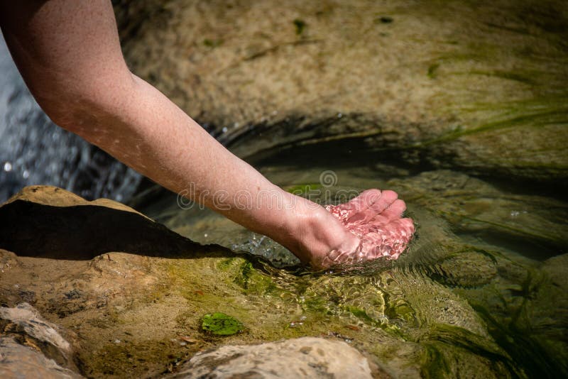 Hand Getting a Handful of Fresh Water from a River Stock Photo - Image ...