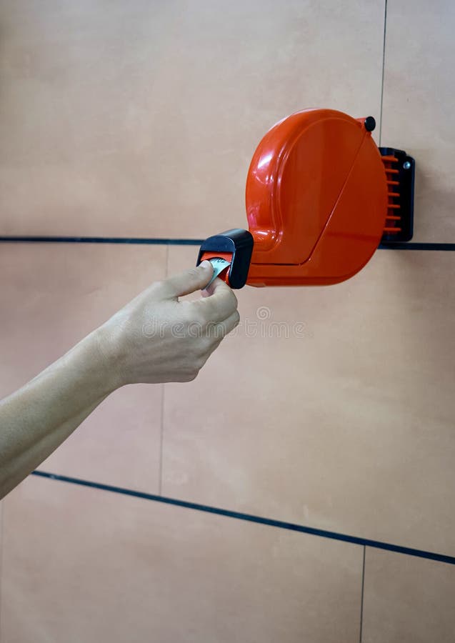 Hand Getting a Number To Wait in Line Stock Photo - Image of ...