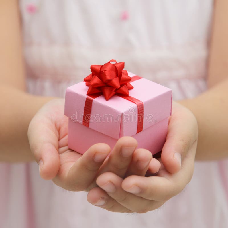 Child Giving Gift stock photo. Image of love, ribbon - 10372216