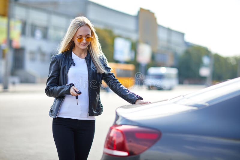Hand a Girl with a Remote Control from Her Car Stock Photo - Image of ...