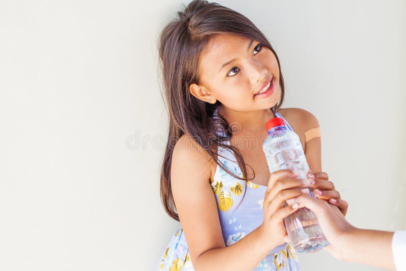 Hand Giving a Bottle of Water To Poor Child Stock Image - Image of ...