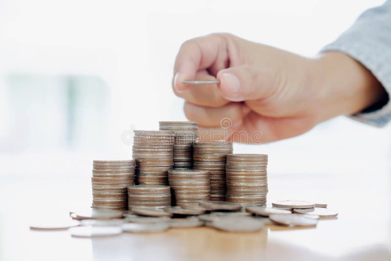 Hand Giving Coins into Stack, Business and Finance Stock Image - Image ...