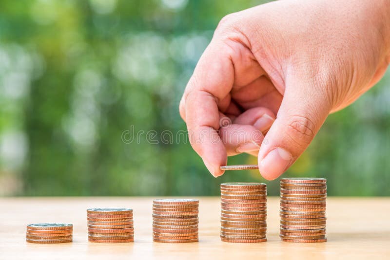 Hand Giving Coins Into Stack, Business And Finance Stock Image - Image ...