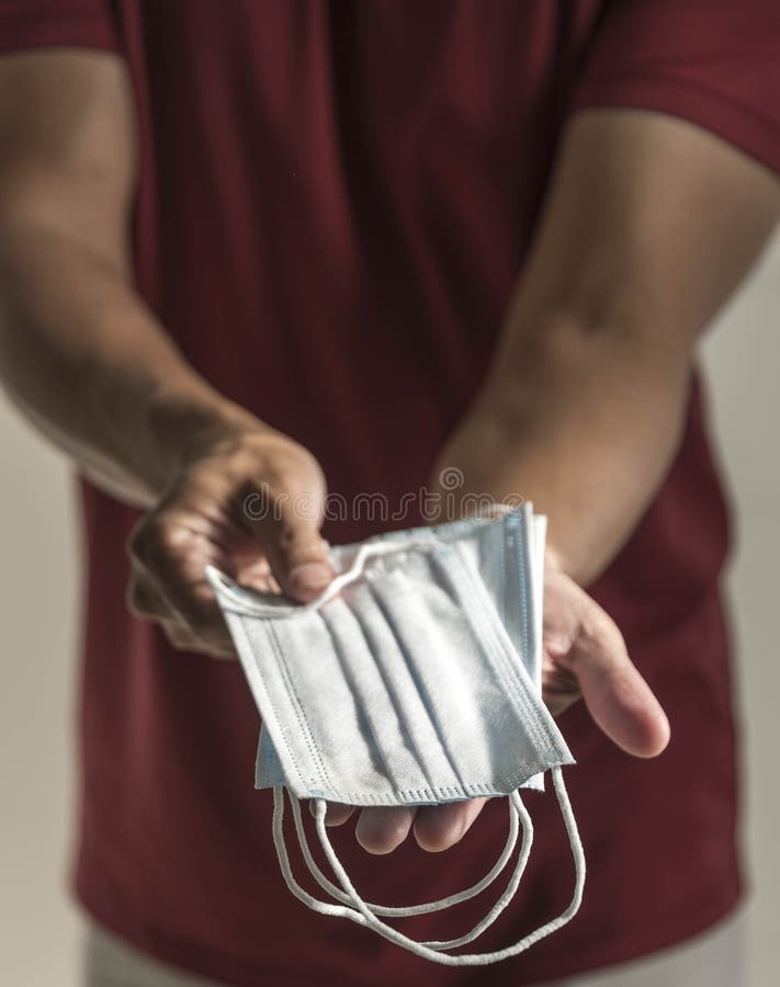 Hand giving face mask stock image. Image of influenza - 192300391