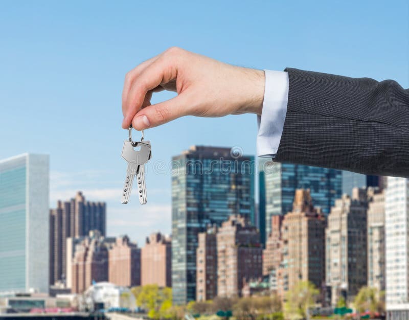 Hand giving key stock photo. Image of exterior, loan - 48875160