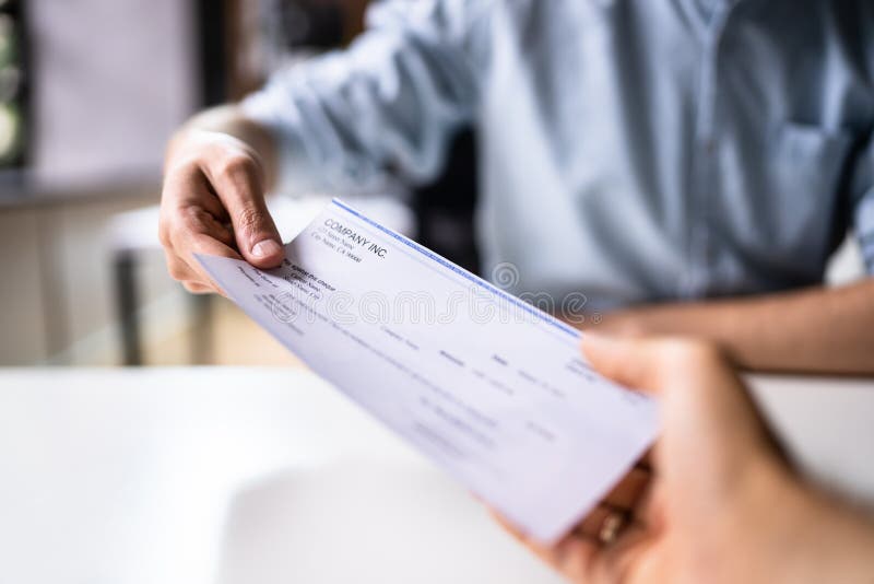 Hand Giving Payroll Cheque. Paycheck Stock Photo - Image of management ...