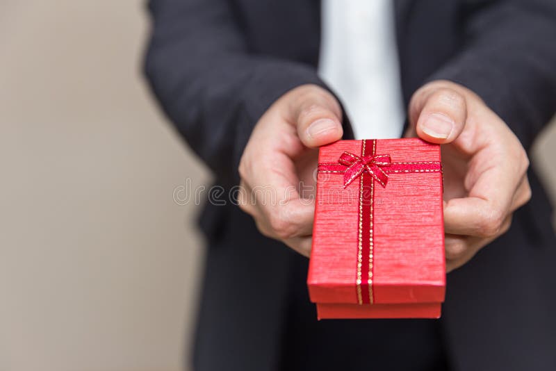 Hand Giving Present Gift Box Reward in Business Office with Space for ...
