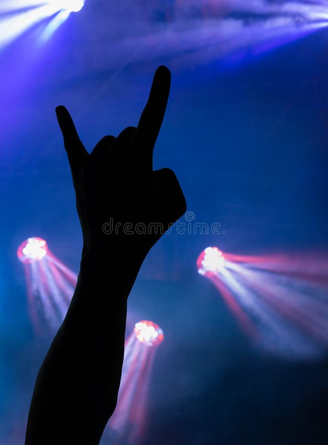 Giving Rock and Roll Sign, Showing Symbol of Horns, Language Gestures ...