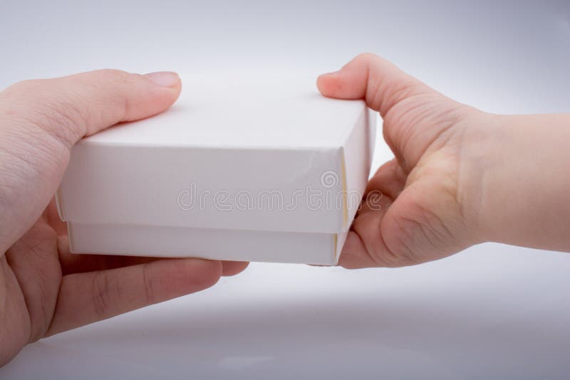 Hand Giving White Gift Box Out Stock Image - Image of present, love ...
