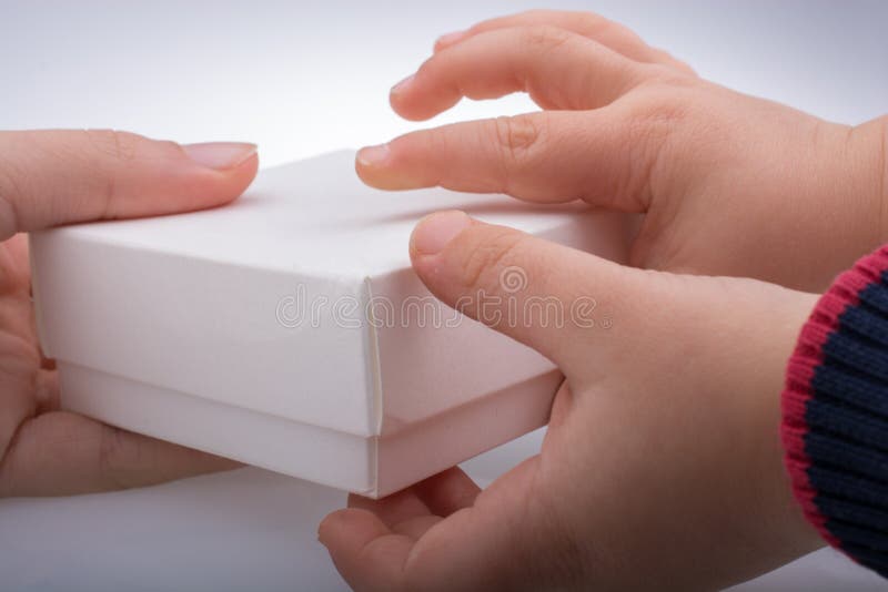 Hand Giving White Gift Box Out Stock Photo - Image of decoration ...