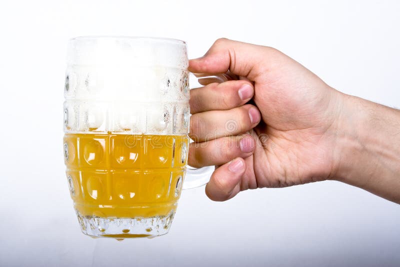 Hand with a glass of beer stock image. Image of german - 3340667