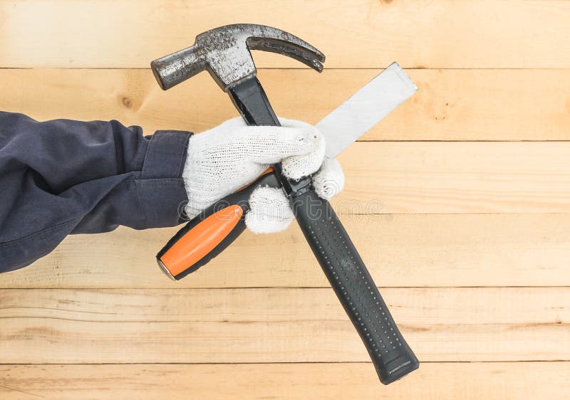 Hand in Glove Holding Chisel and Hammer Stock Photo - Image of ...