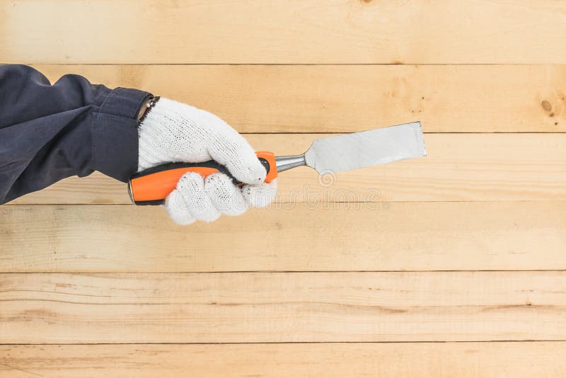 Hand in Glove Holding Chisel Stock Image - Image of handyman, activity ...