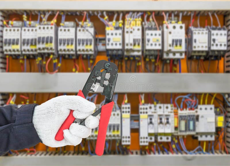 Hand Glove Holding Wire Stripper Control Panel Cabinet Stock Photos ...