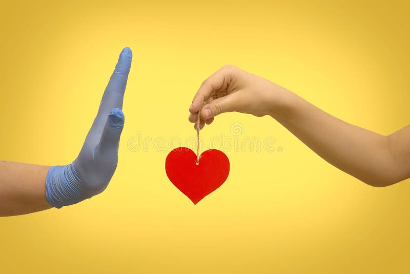 Hand without Glove Holds Heart and Gets Rejected by Gloved Hand on a ...