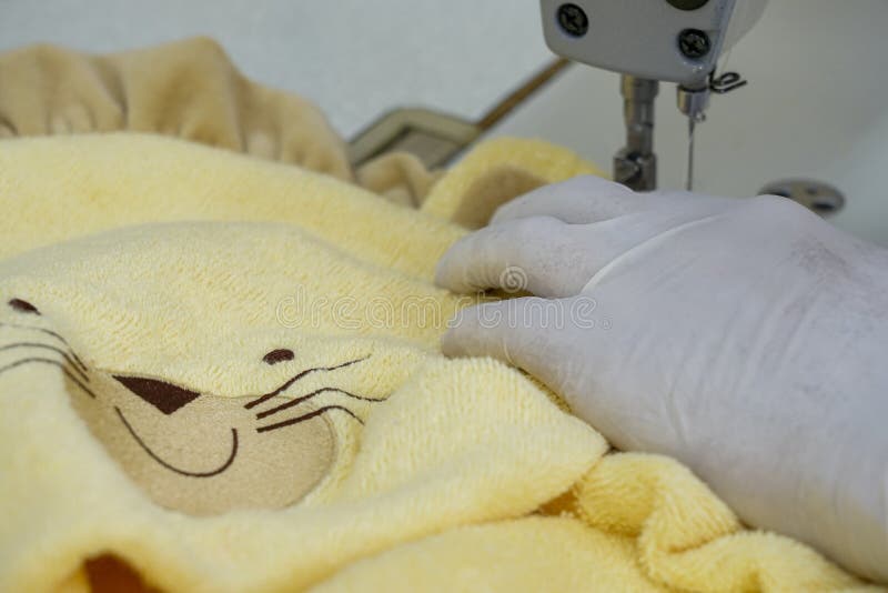 Hand in a Glove Near a Sewing Machine Stock Photo - Image of tailor ...