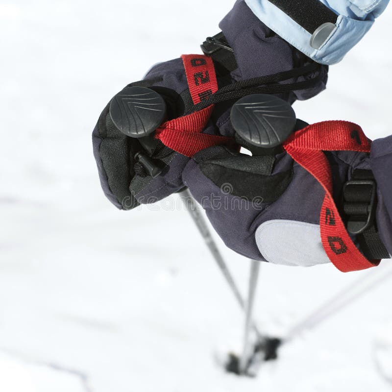 Hand in Gloves Holding Ski Poles. Conceptual Image Stock Photo - Image ...