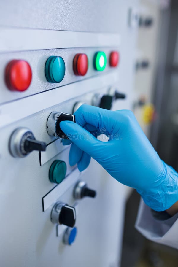 Hand with Gloves Turning Buttons of the Machine Stock Image - Image of ...