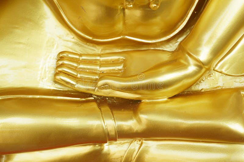 The hand of gold buddha stock image. Image of person - 29462579