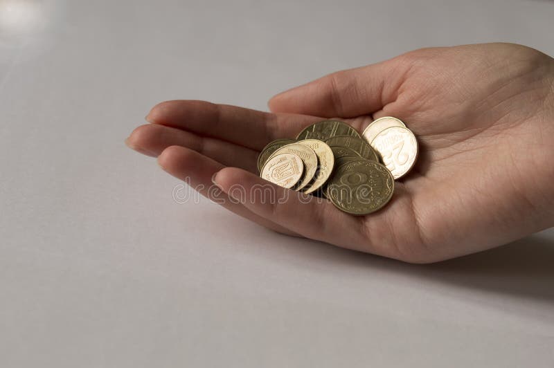 Hand with gold coins stock photo. Image of paying, concept - 49840954