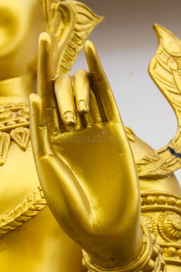 Hand of golden god statue stock photo. Image of indoors - 40519190