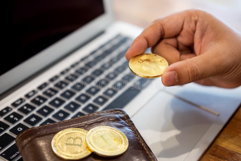 Hand with Golden Metal Bitcoin Crypto Currency Investment- Symbolic ... Hand with Golden Metal Bitcoin Crypto Currency Investment- Symbolic ...