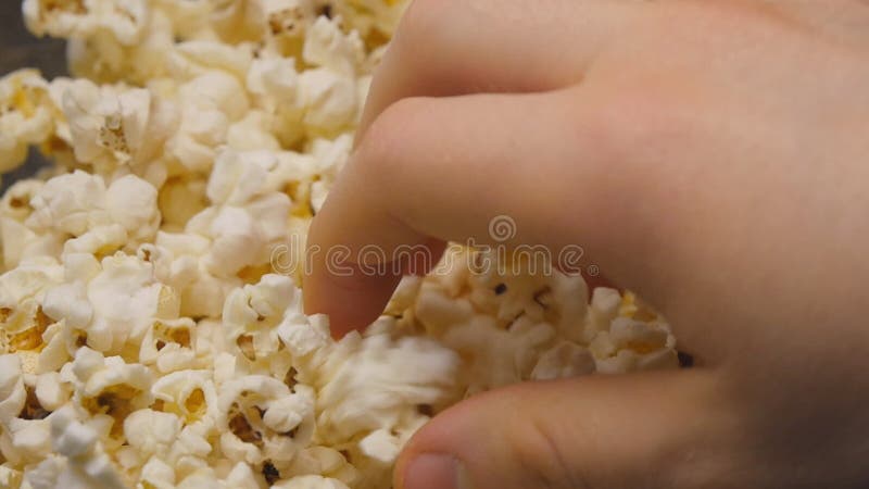Popcorn in the Hand. Eating Sweet Food Outside in a Public Park Stock ...