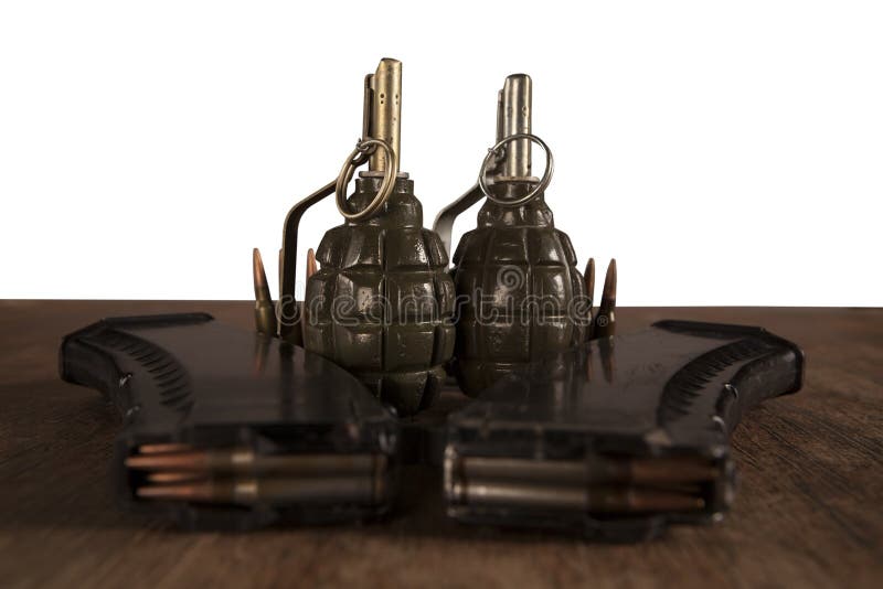 Hand Grenade and Ammunition on Table Isolated on White Background Stock ...