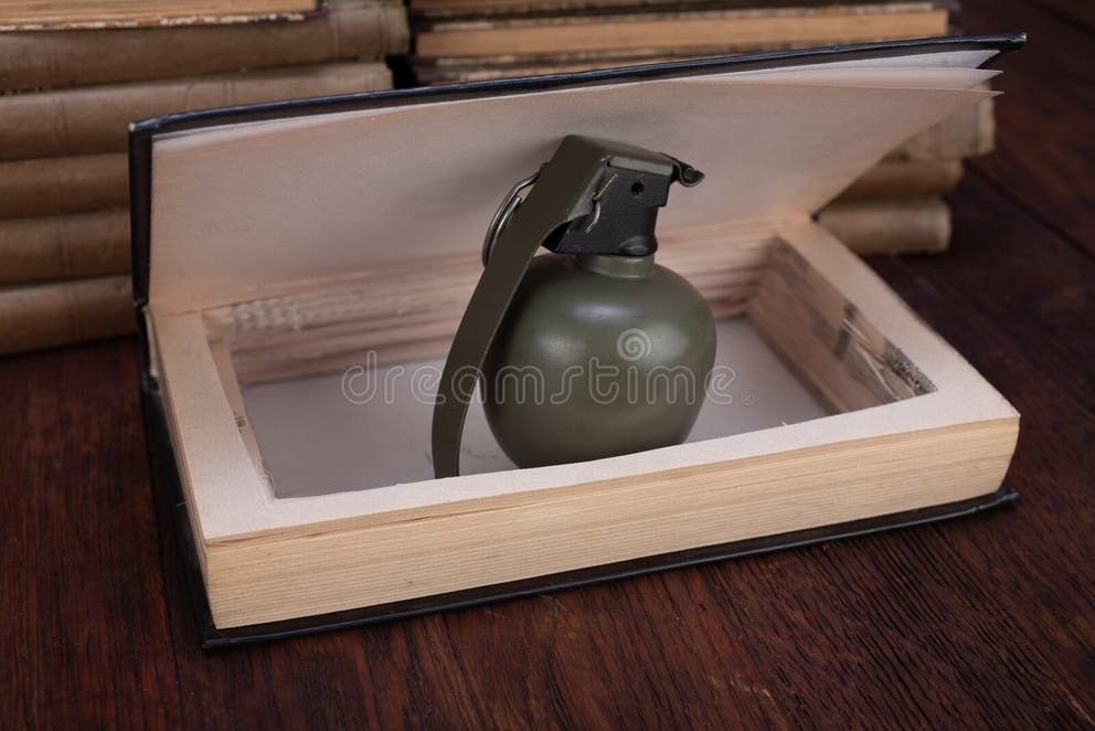 Hand Grenade Hidden in a Book Stock Photo - Image of grenade, case ...