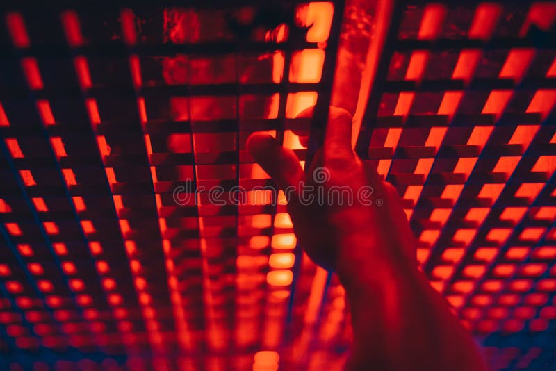 Hand on a grid red light stock photo. Image of grid - 128952220