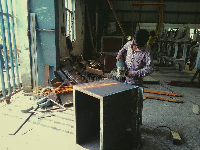 Hand grinding operation editorial stock image. Image of manufacturing ...