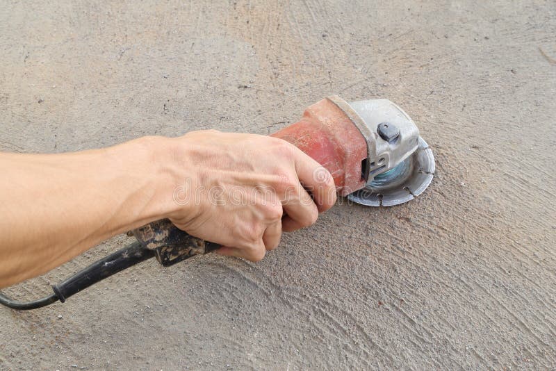 Hand with grinding tool stock image. Image of electric - 42554229