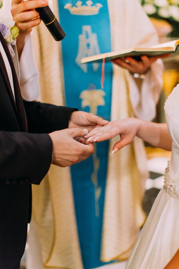 Putting a Wedding Ring on Bride S Finger Stock Image - Image of ...