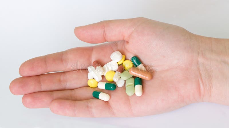 Hand With Group Of Pills And Capsules Picture. Image: 9568208