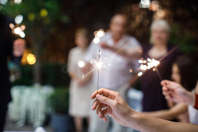 Hand of Guest Holding Bengal Light at the Party Stock Photo - Image of ...