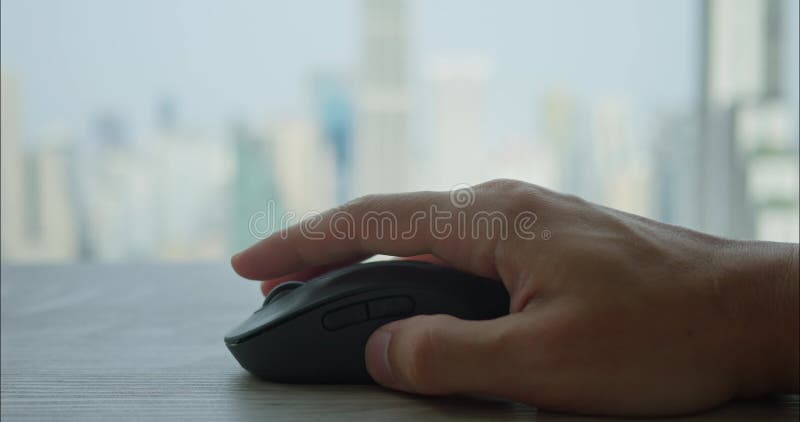 Hand Guides Computer Mouse Across Desk Navigating through Tasks with ...