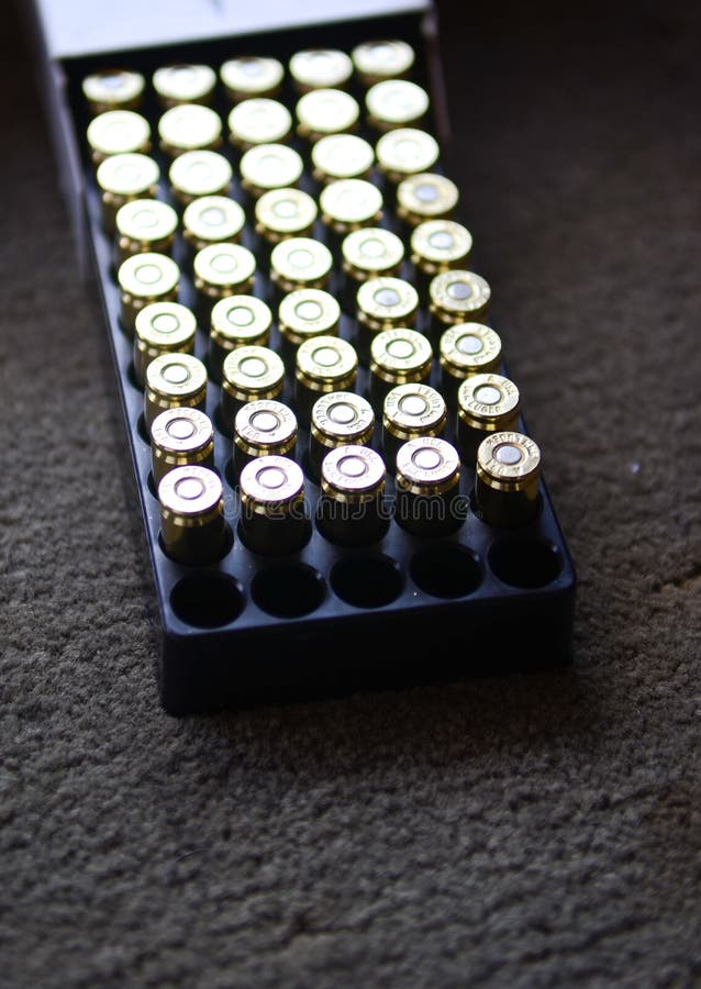 Hand gun bullets stock image. Image of conflict, brass - 39025169