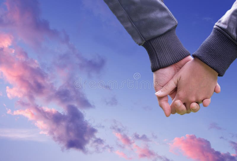 Hand in hand at sunset stock image. Image of feeling - 49878765