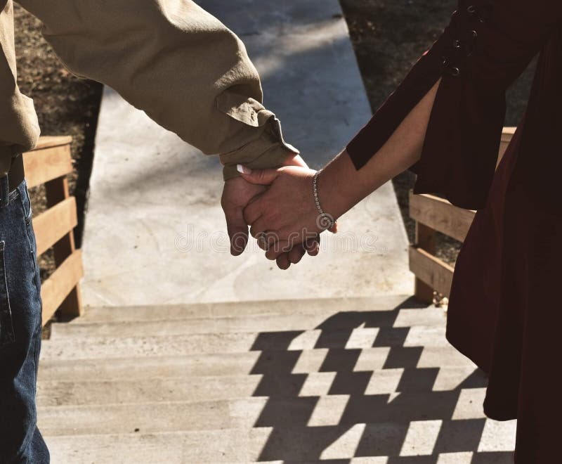 Hand in hand we walk stock photo. Image of life, walk - 232177794