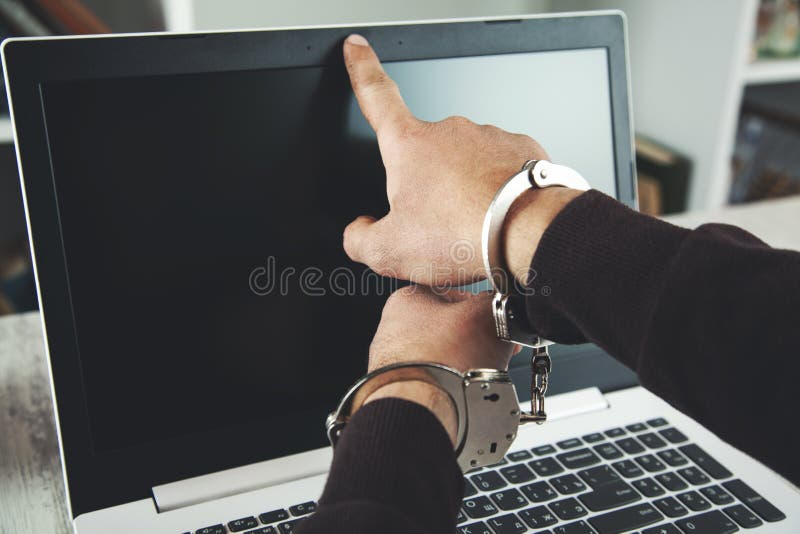 Hand Handcuffs on Computer Camera Stock Image - Image of business ...