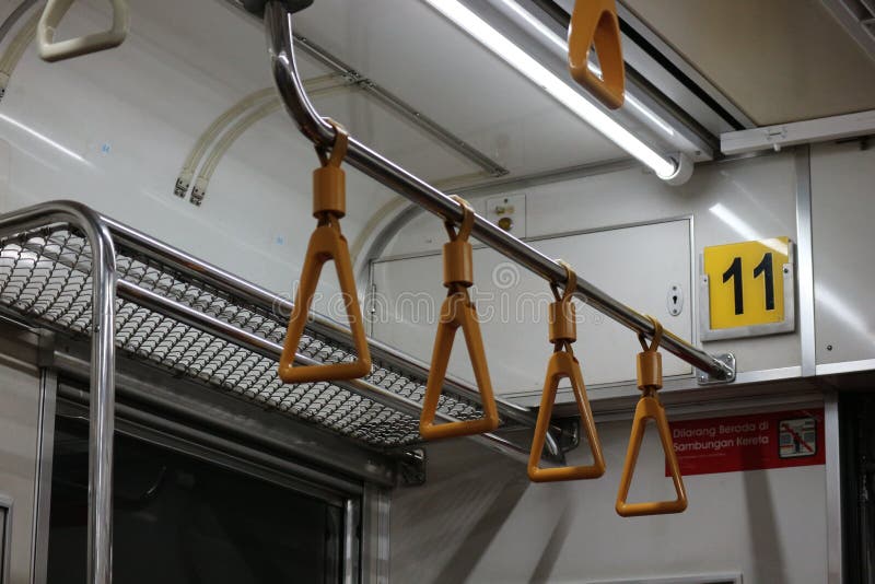 The Hand Handle or Handgrips or Handrails of Commuter Line Passengers ...