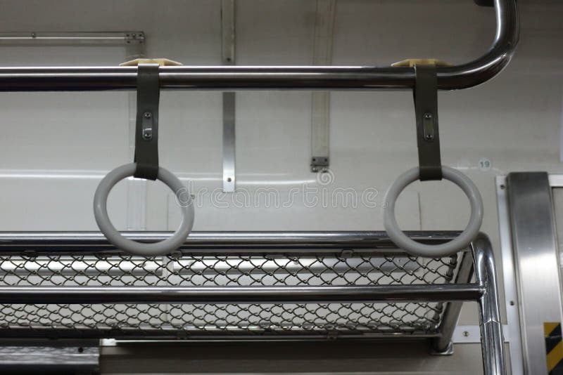The Hand Handle or Handgrips or Handrails of Commuter Line Passengers ...