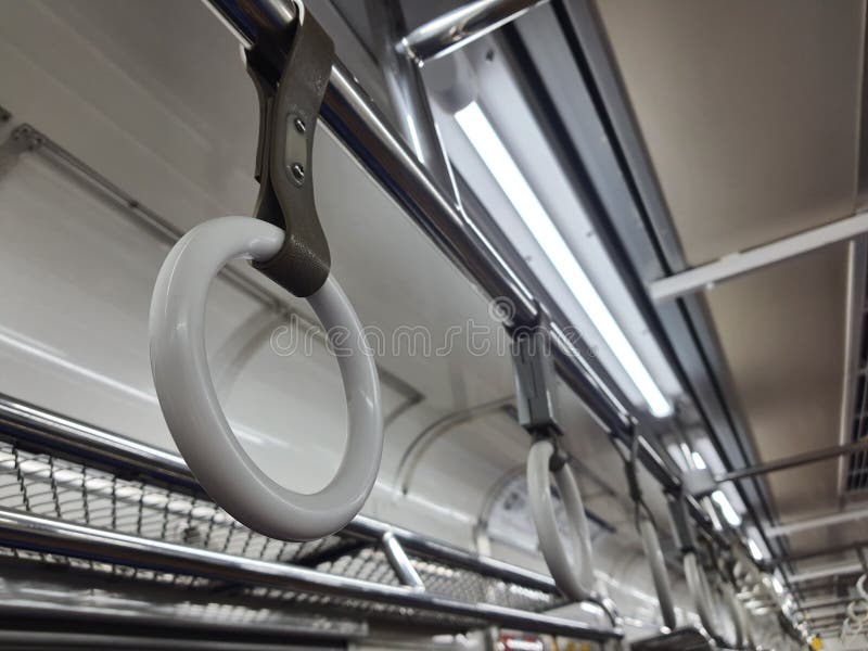 The Hand Handle or Handgrips or Handrails of Commuter Line Passengers ...